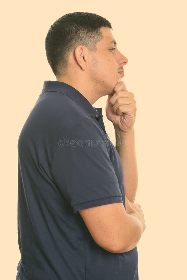 Profile View of Young Hispanic Man Thinking Studio Shot Stock Image ...