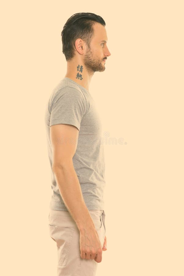 Profile View of Young Man Standing Stock Image - Image of facing ...