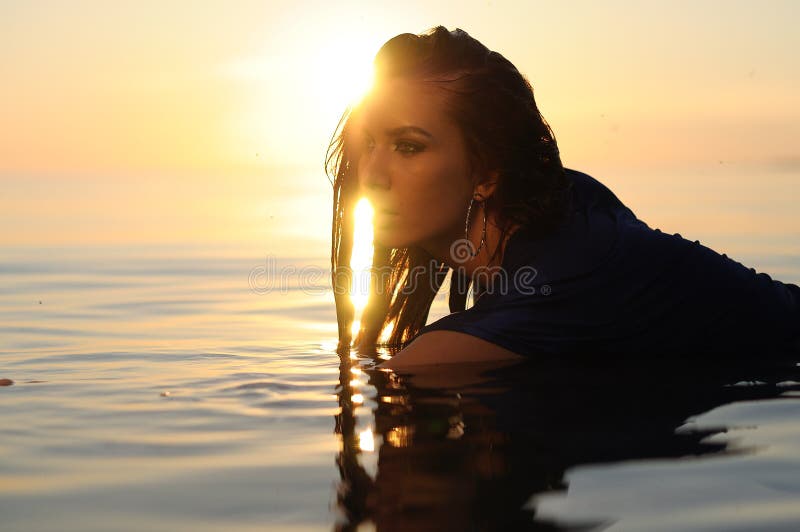 Profile of Woman in Dramatic Sunset Stock Photo - Image of beautiful ...