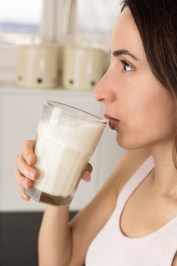 Profile of Woman Drinking Milk Stock Photo - Image of people, beautiful ...