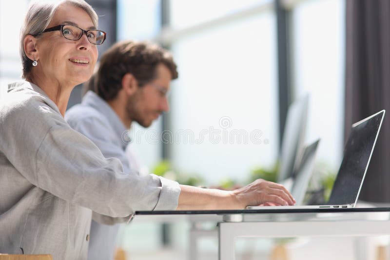 60 Year Old Business Woman in a Work Environment Stock Photo - Image of ...