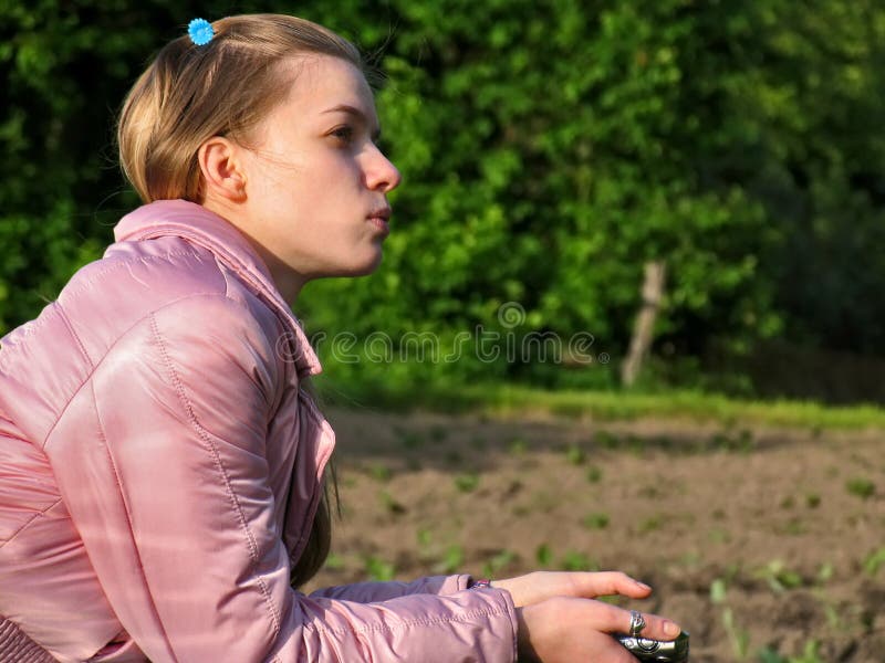Profile of Young Girl Looking into the Distance Stock Image - Image of ...