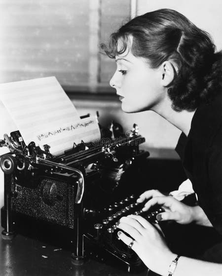 Profile of a Young Woman Typing Musical Notes with a Typewriter Stock ...