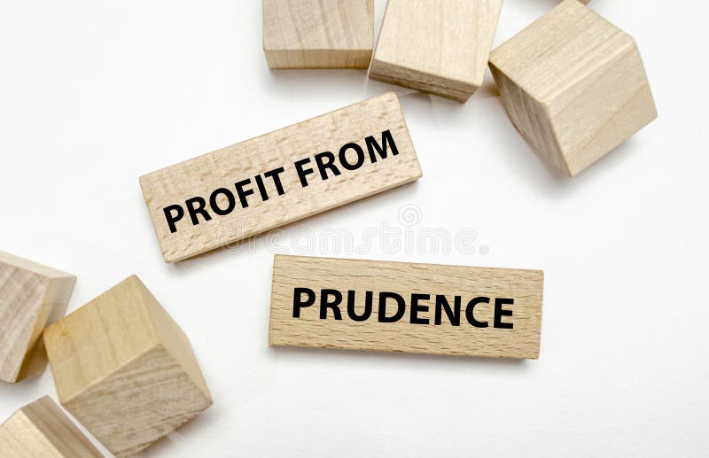 PROFIT from PRUDENCE on Wooden Blocks on White Background Stock Photo ...