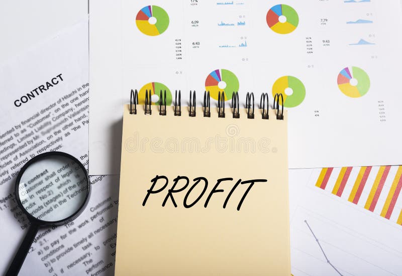 Profit Word on Yellow Spiral Notebook Analytical Chart Documents with ...
