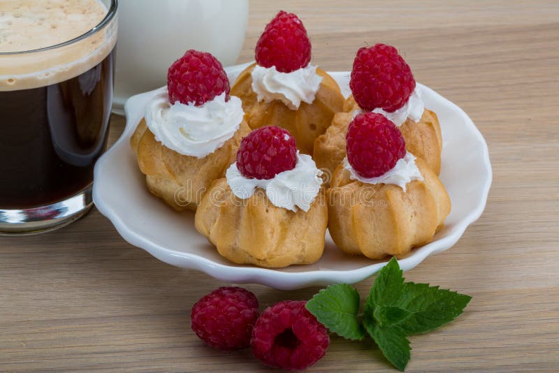 Profiterole with raspberry stock photo. Image of puff - 50548086