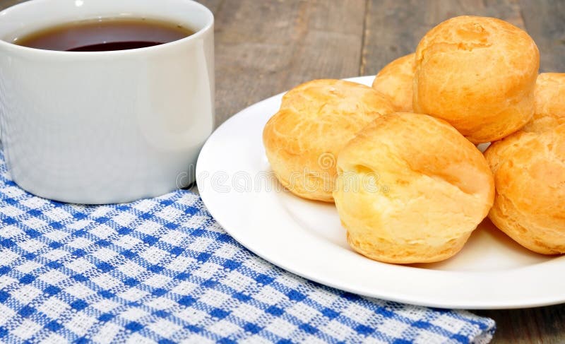 Profiteroles and a Cup of Tea Stock Photo - Image of french, baking ...
