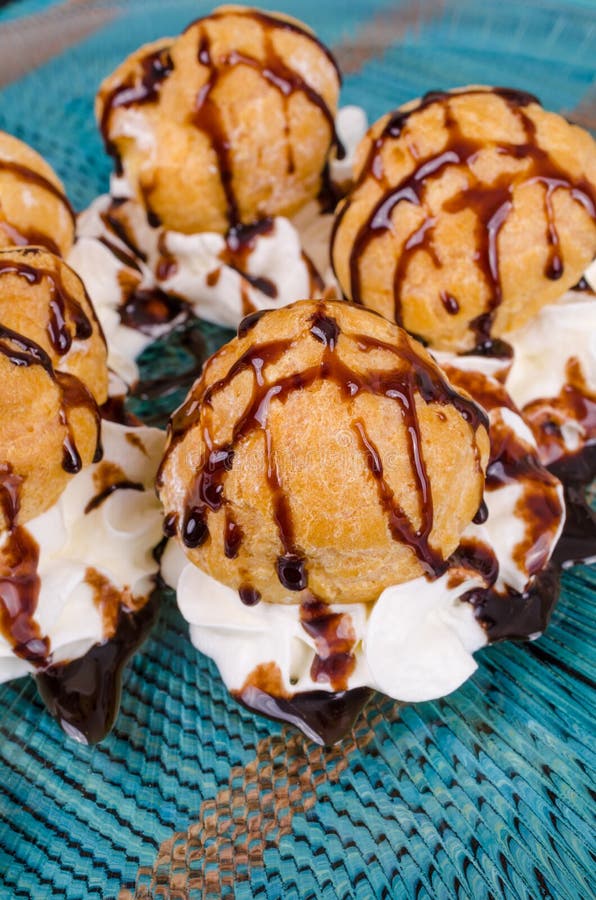 Profiteroles stock photo. Image of filled, garnished - 84390710