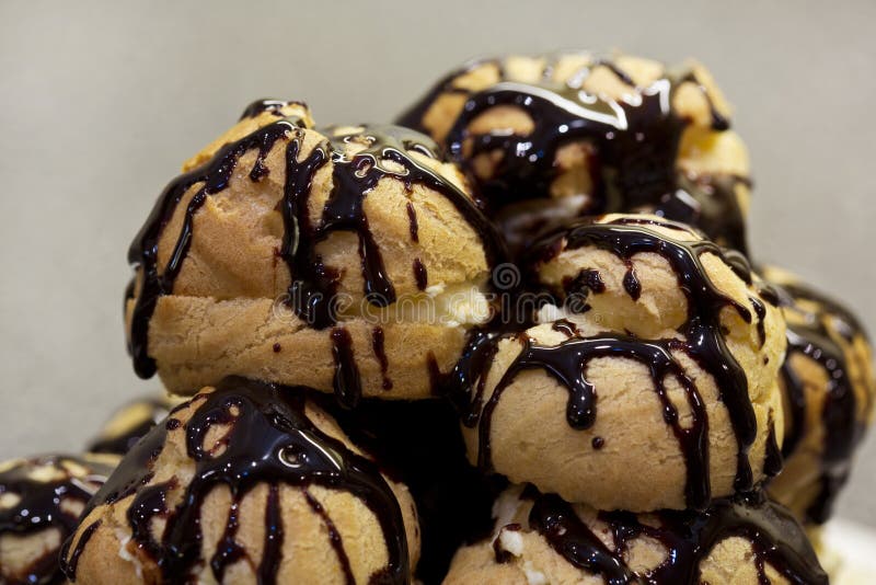 Profiteroles stock photo. Image of stack, cream, plate - 47130208