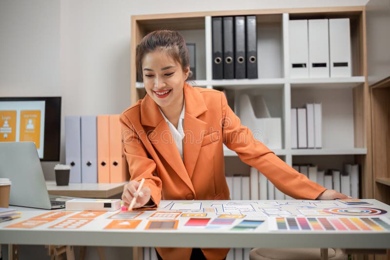 Program Developer Planning UX/UI Design in Modern Office Setting with ...