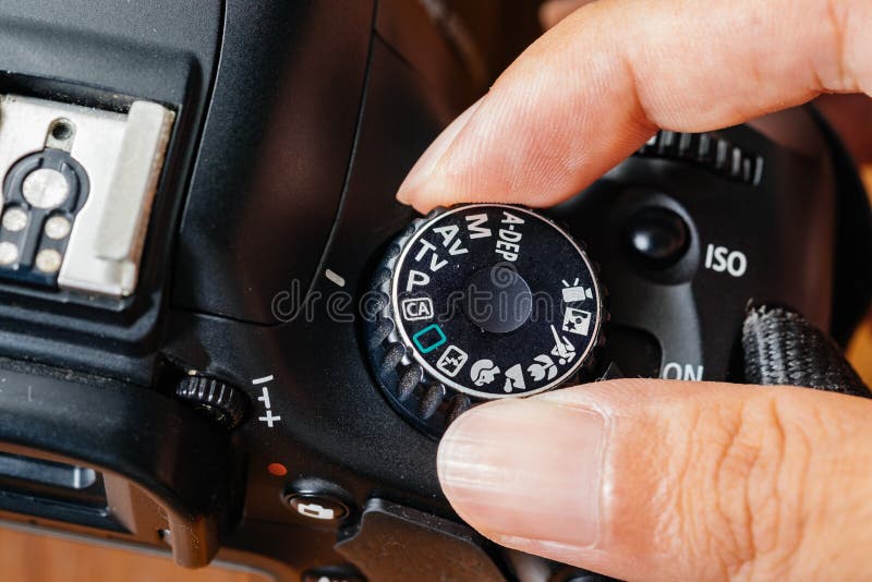 Program Dial Mode on Dslr Camera with Fingers on the Dial Stock Photo ...
