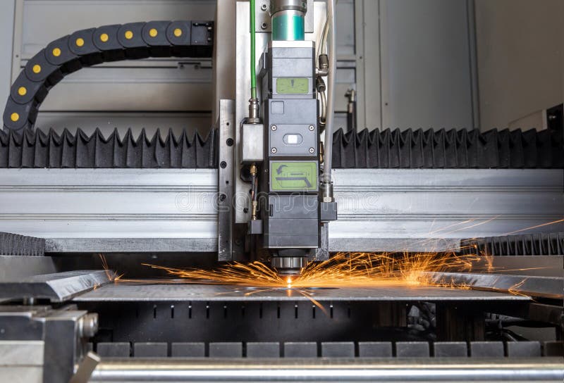 Programmable Machine for Laser Cutting of Metal. Sparks from Laser ...