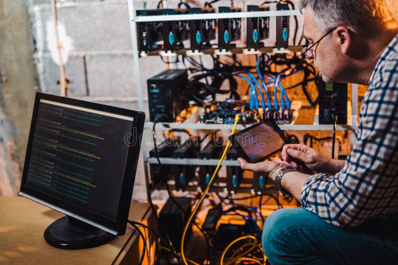 Programmer Adjusting Cryptocurrency Mining Rig Stock Image - Image of ...