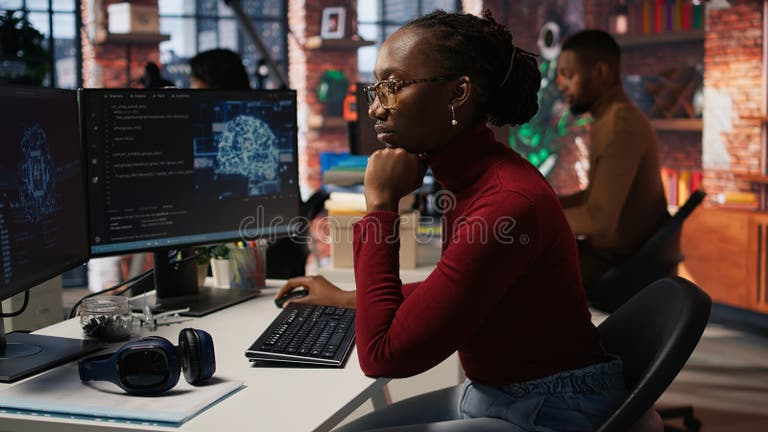 Programmer Coding Artificial Intelligence Algorithms In Startup Stock