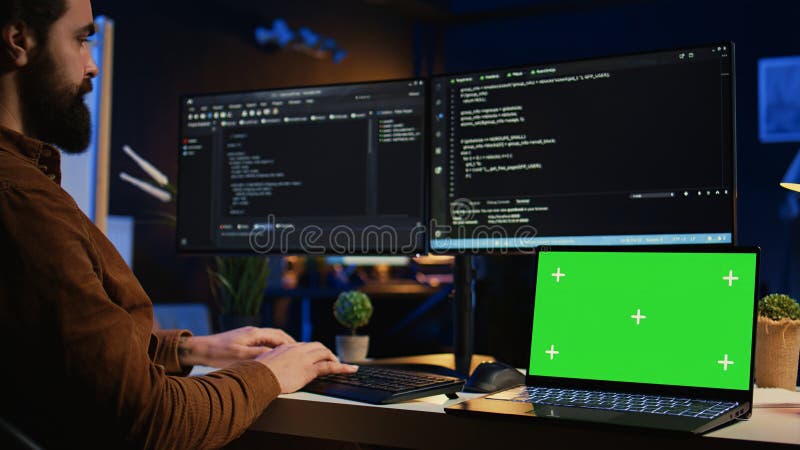 Programmer Coding on Computer Next To Isolated Screen Laptop in Home Office Stock Photo - Image ...