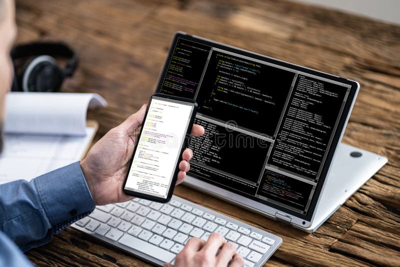Programmer Coding on Laptop and Smartphone Stock Image - Image of ...