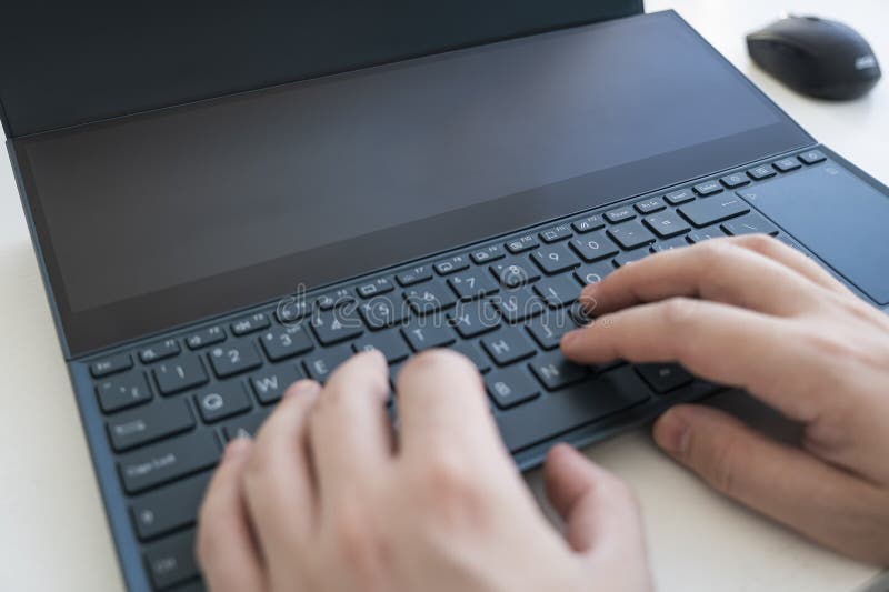 Programmer Or Computer Hacker Typing Code On Laptop Keyboard Keypad Is Lit In White Light Hand