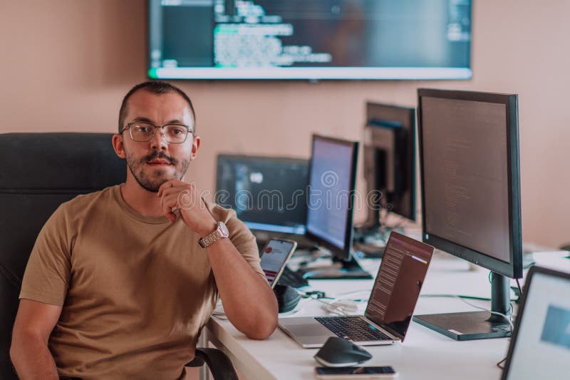 A Programmer Diligently Testing Smartphone Applications while Sitting ...