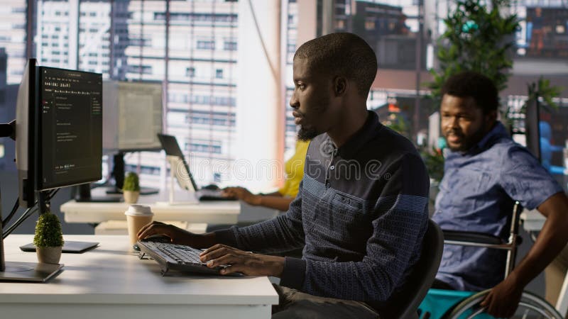Programmer Doing Software Debugging, Asking for Help from Smiling Team Leader Stock Photo ...