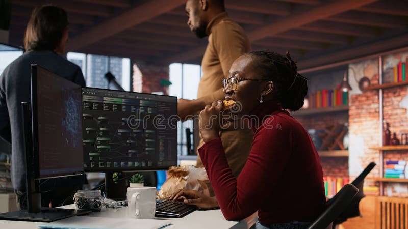 Programmer Eating Snack at Desk and Coding Advanced AI Algorithm in Startup Stock Image - Image ...