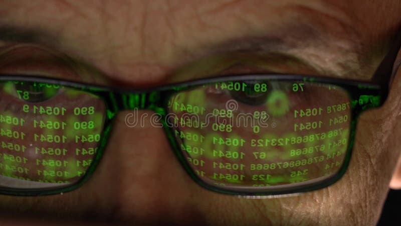 Programmer with Glasses in Front of the Display. Detail of a Person Eye ...