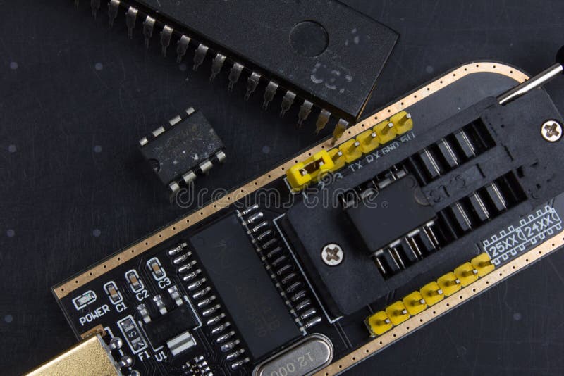 Programmer with Inserted Microchip Memory. Electronics Repair Stock ...