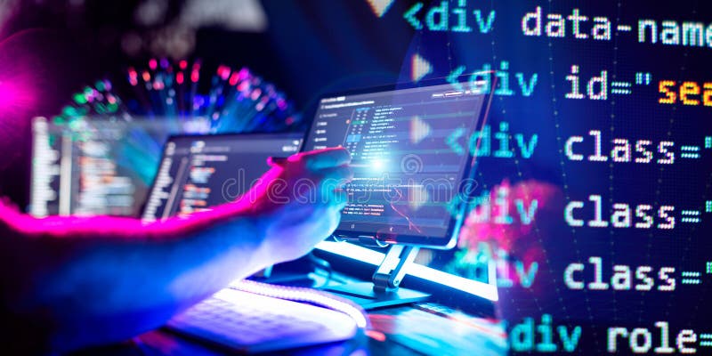 Programmer Manually Working With Program Code On A Computer At Night In A Data Center Stock