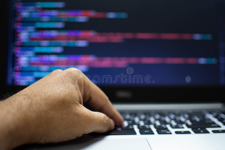 The Programmer S Hand is Writing the Source Code. Programmers Write Programs for Use with ...