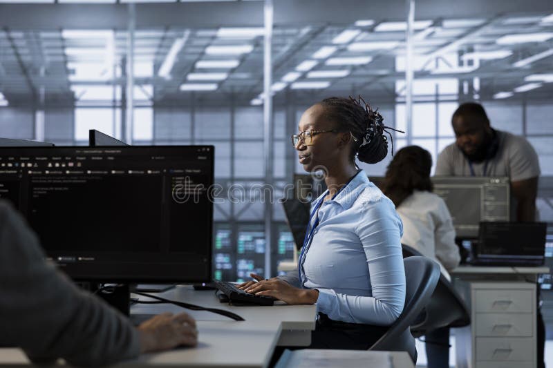 Programmer in Server Farm Implementing Power Management Solutions Stock ...