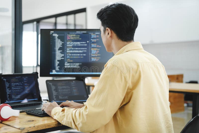 It Programmer Starts Working on Desktop Computer. Stock Image - Image ... It Programmer Starts Working on Desktop Computer. Stock Image - Image ...