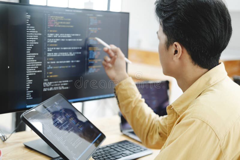 It Programmer Starts Working on Desktop Computer. Stock Photo - Image ...