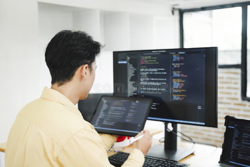 It Programmer Starts Working on Desktop Computer. Stock Image - Image of coder, developer: 298019867
