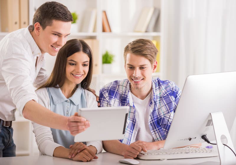 Programmer team stock image. Image of colleagues, laptop - 55616513 Programmer team stock image. Image of colleagues, laptop - 55616513