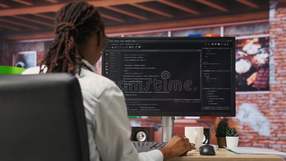 Programmer Types Code into PC, Entering Commands, Running Script Stock ...