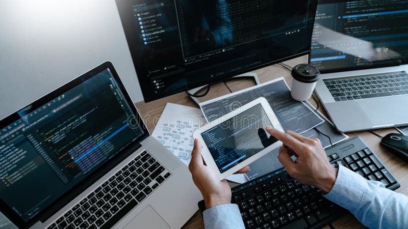 Programmer Typing Code On Desktop Computer Developing Programming And Coding Technologies