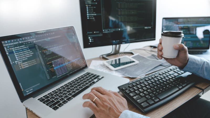 Programmer Typing Code on Desktop Computer, Developing Programming and ... Programmer Typing Code on Desktop Computer, Developing Programming and ...