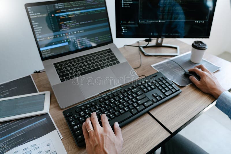 Programmer Typing Code On Desktop Computer Developing Programming And Coding Technologies
