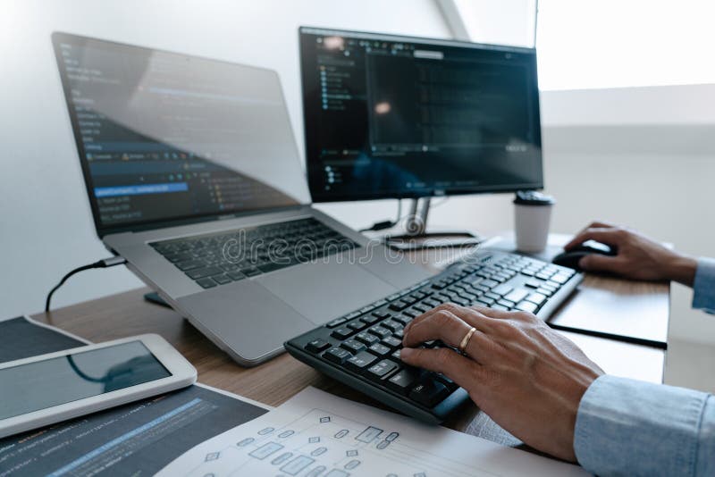 Programmer Typing Code On Desktop Computer Developing Programming And Coding Technologies