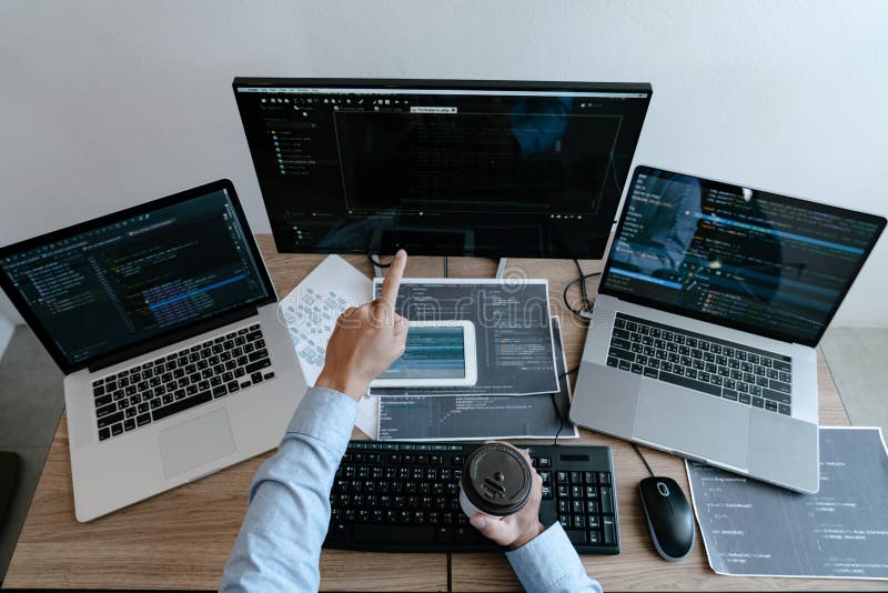 Programmer Typing Code on Desktop Computer, Developing Programming and ... Programmer Typing Code on Desktop Computer, Developing Programming and ...