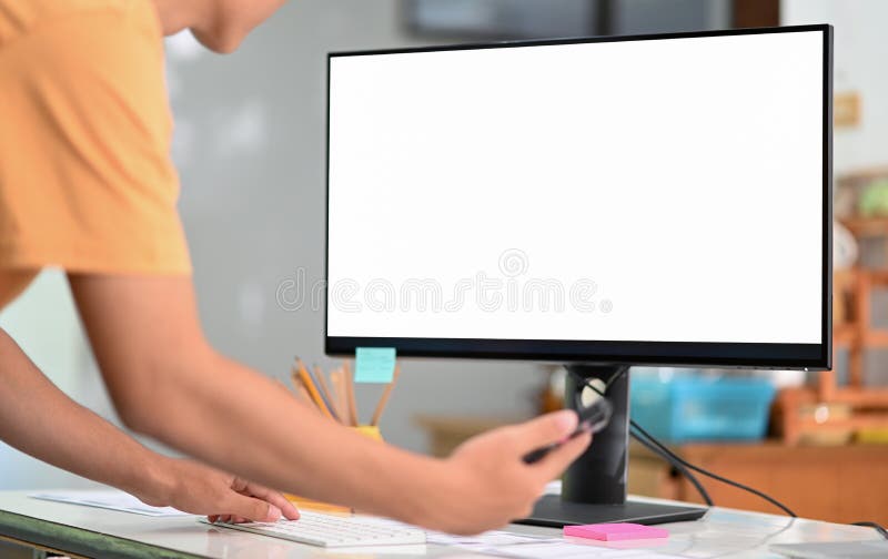 Programmer Using Mockup Blank Screen Computer on a Programming Desk ...