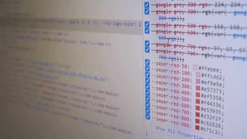 Programmer Views The Html Code Of The Page On A Screen Of A Computer