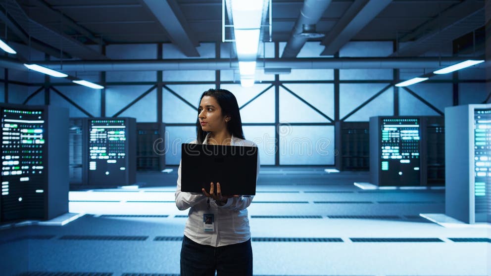 Programmer Walking in Data Center, Coding on Laptop Stock Photo - Image of network, programmer ...