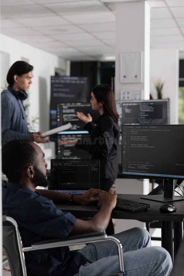 It Programmer in Wheelchair Typing Html Code in Coding Office Stock ... It Programmer in Wheelchair Typing Html Code in Coding Office Stock ...