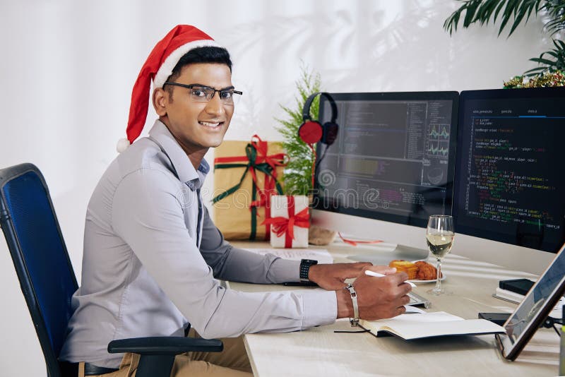 Programmer Working on Christmas Stock Photo - Image of male, modern ...