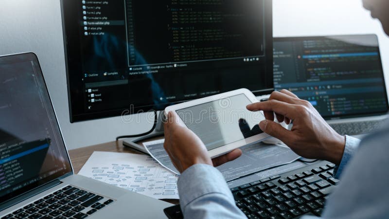 Programmer Working On Computer In It Office Typing Data Coding In Software And Checking Code On