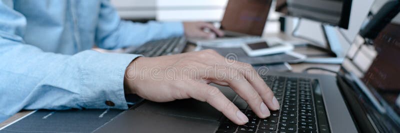 Programmer Working On Computer In It Office Typing Data Coding In Software And Checking Code On