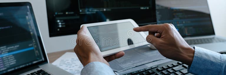 Programmer Working on Computer in it Office Typing Data Coding in ...