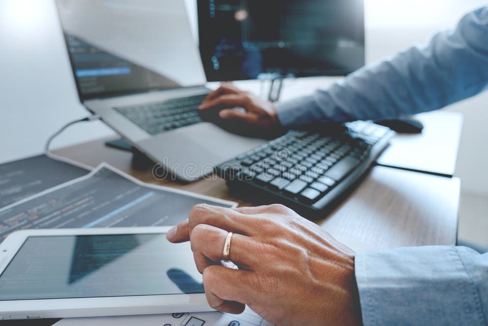Programmer Working on Computer in it Office Typing Data Coding in ...