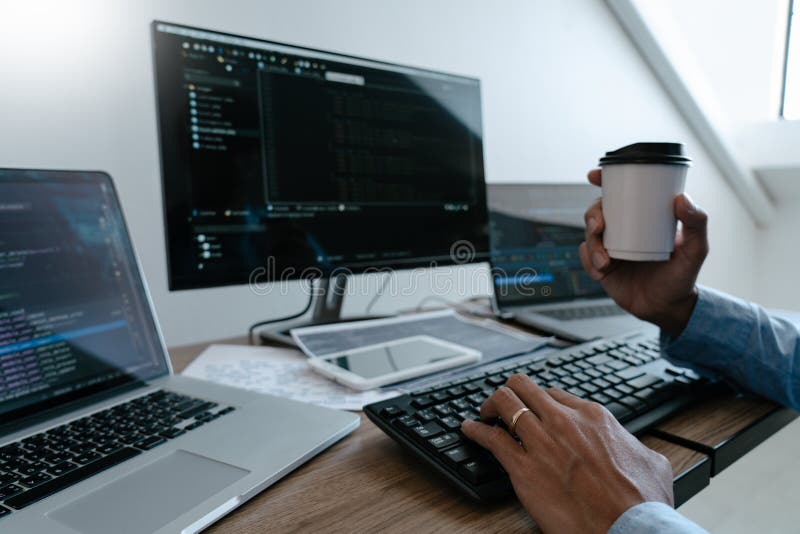 Programmer Working On Computer In It Office Typing Data Coding In Software And Checking Code On