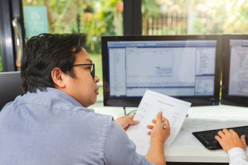 Programmer Working in a Software Developing. Developing Programming and ... Programmer Working in a Software Developing. Developing Programming and ...